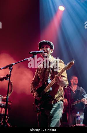 Andy Platts, vocalist with the band Mamas Gun, performing on stage ...