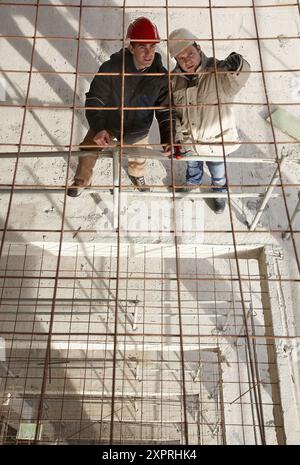 Above view on concrete skeleton of new unfinished multi-storey building ...