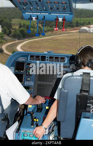 Interior view of the pilot hands and instrument panel cockpit of ...
