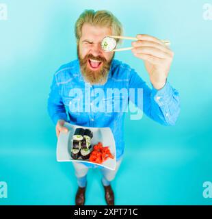 Philadelphia rolls. Pickled ginger, wasabi. Japanese cuisine, sushi ...