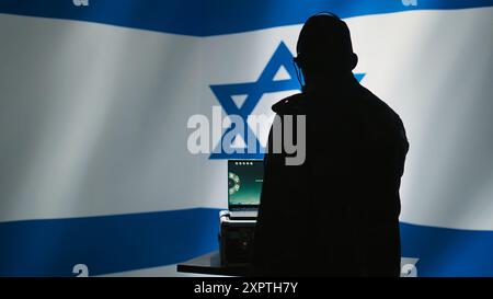 Israel Defense Forces dispatcher looking at surveillance transmission ...