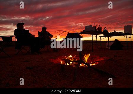Sunset and camp fire, Simpson Desert, outback South Australia ...