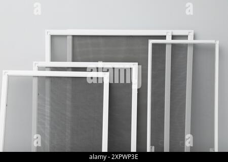 Set of window screens on light grey background Stock Photo - Alamy
