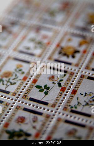 Philately collection: assorted used postage stamps cut from letters or ...