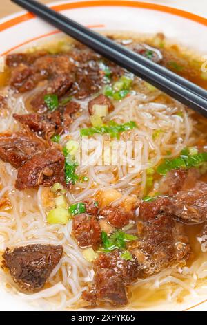 Traditional Chinese Braised Beef Rice Noodles with Bok Choy and ...