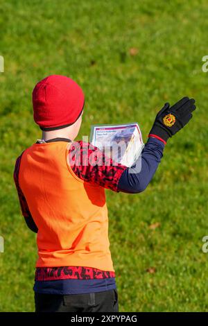Primary school children on an orienteering lesson in the park Stock ...