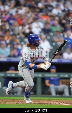 New York Mets' Jesse Winker runs after hitting a single against ...