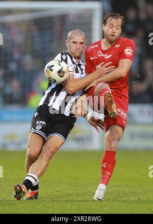 St Mirren's Alex Gogic (left) and Rangers' Cyriel Dessers battle for ...