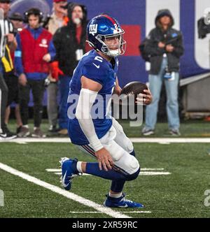 New York Giants quarterback Drew Lock warms up before an NFL football ...