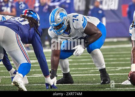 Detroit Lions guard Kayode Awosika walks off the field after an NFL ...