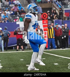 Isaac Ukwu, a defensive end for the Detroit Lions, acts out a scene ...