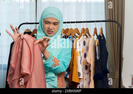 Young Arab Woman Cleaning Home And Standing Near Big Blank Smartphone ...