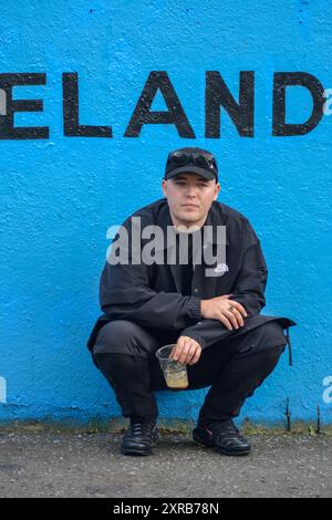 Liam Og O Hannaidh (Mo Chara) from Kneecap wearing a keffiyeh whilst ...