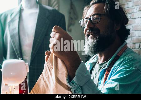 tailor man using a leather sewing machine Stock Photo - Alamy