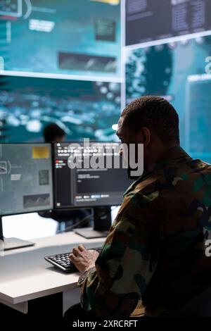 Army intelligence officers use modern computer systems and satellite ...