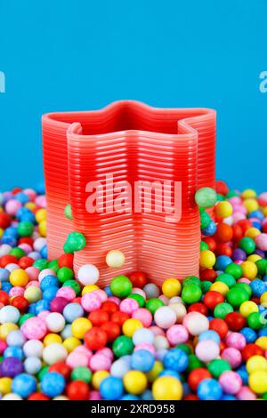 Colorful spheres inside star shaped column Stock Photo - Alamy