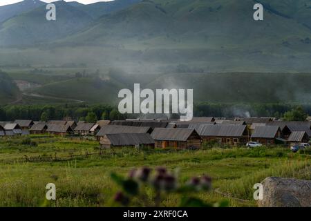 Morning Mist Over Xinjiang Homes Stock Photo - Alamy