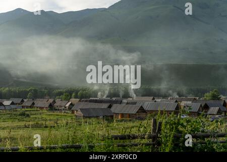 Morning Mist Over Xinjiang Homes Stock Photo - Alamy