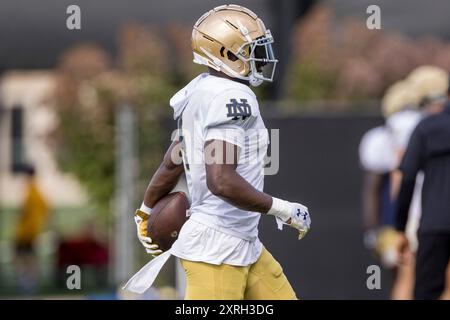 Notre Dame running back Jeremiyah Love (4) is tackled by Stanford ...