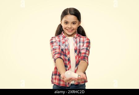 teen genius girl on background. photo of teen genius girl with bulb ...