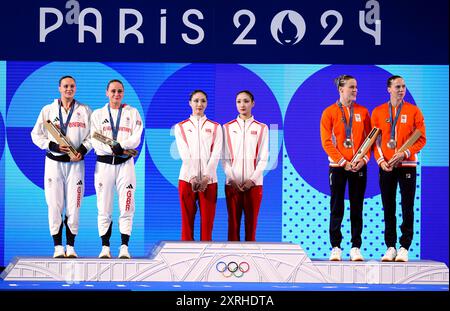 Bronze medalists Isabelle Thorpe, right and Ranjuo Tomblin of Britain ...