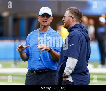 Seattle Seahawks special teams coordinator Jay Harbaugh jogs off the ...