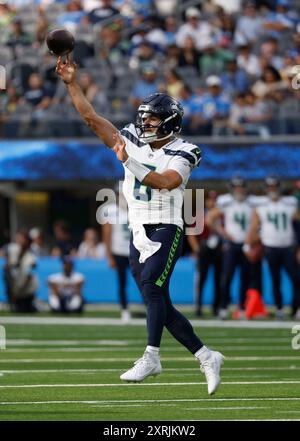 Seattle Seahawks quarterback Sam Howell warms up before an NFL football ...