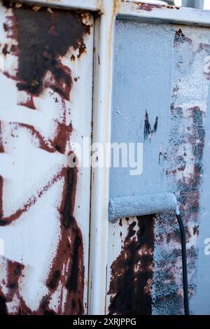 Anti-rust primer paint roller, on the rusty metal panel Stock Photo - Alamy