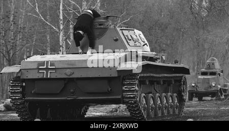 After Battle. Re-enactor Dressed As Dead German Tank Crew Lies Slain On ...