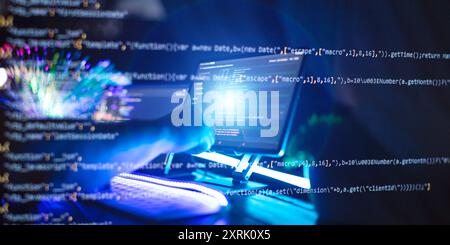 Programmer manually working with program code on a computer at night in ...