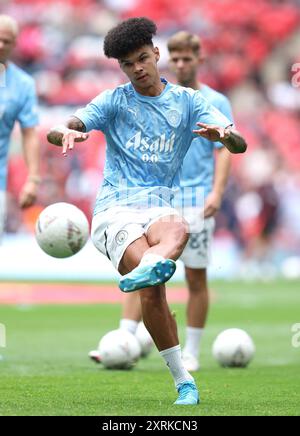 Nico O'Reilly of Manchester City warms up before the Nottingham Forest ...