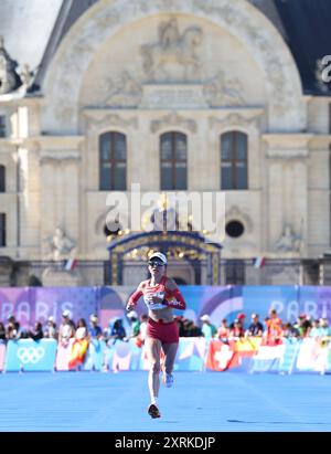 Zhang Deshun of China competes during the women's marathon competition ...