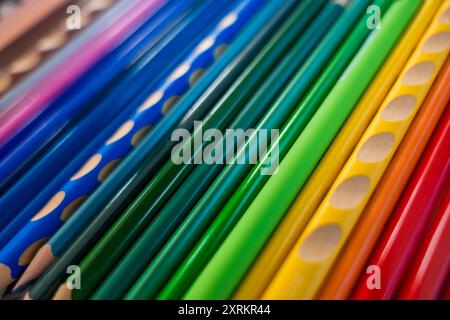 Vibrant colored pencils perfectly aligned for a creative challenge ...