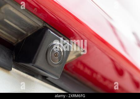 Red car rear view camera close up for parking assistance Stock Photo ...