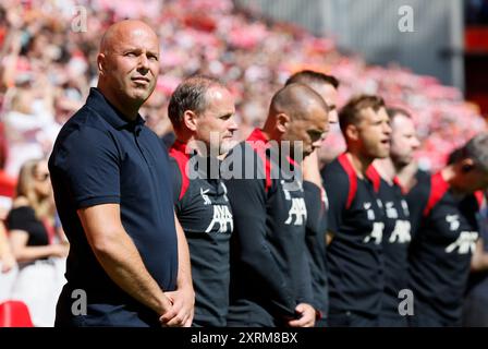 Liverpool manager Arne Slot (left) and head of rehab physiotherapy Lee ...