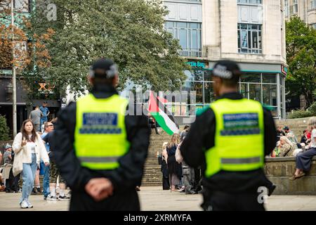 Swansea. Wales. Police watch the crowd at a anti-racist protest ...
