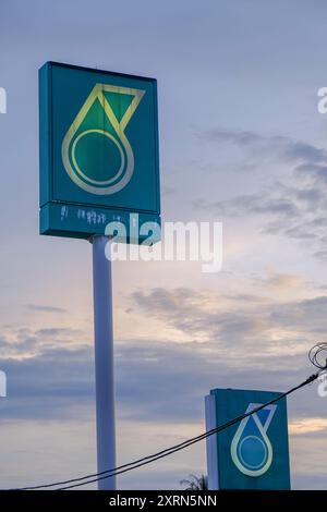 Petronas petrol station sign seen during sunset. Daily life photo of ...