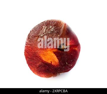 rotten nectarine in front of white background Stock Photo - Alamy