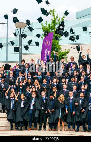 Graduates throwing their mortarboards after the ceremony. UWE ...