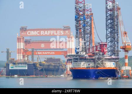 YANTAI, CHINA - AUGUST 7, 2024 - A large ship is under construction at CIMC Raffles ...