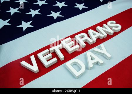 Happy Veterans Day alphabet letters and American flag background Stock ...