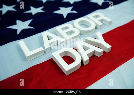 Happy Labor Day alphabet letter and American flag on wooden background ...