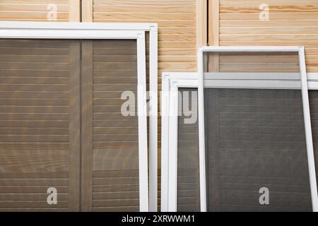 New window screens near wooden folding screen Stock Photo - Alamy