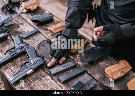 instructor in sport shooting to test your weapons in nature Stock Photo ...