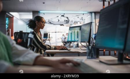 Black Female Game Developer Using Desktop Computer With 3D modelling ...