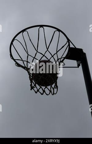 Netball practising shooting - sport aiming aim accuracy goal net Stock ...