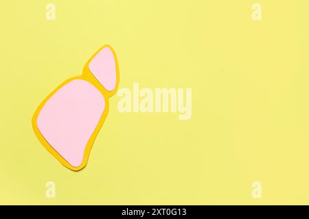 Pink paper liver on yellow background Stock Photo - Alamy