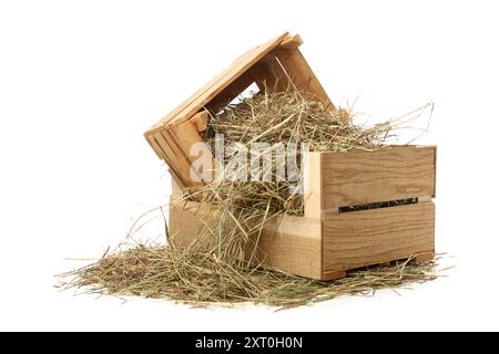 Straw in crates on white background Stock Photo - Alamy