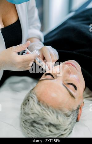 Aesthetic procedure involving hyaluronic acid and botox injections ...