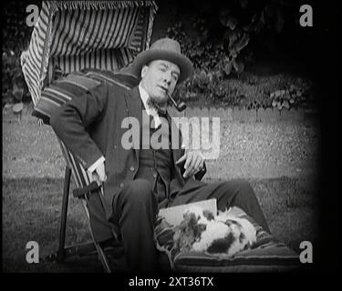 Matheson Lang Relaxing in a Deck Chair Smoking a Pipe, 1920s. From ...